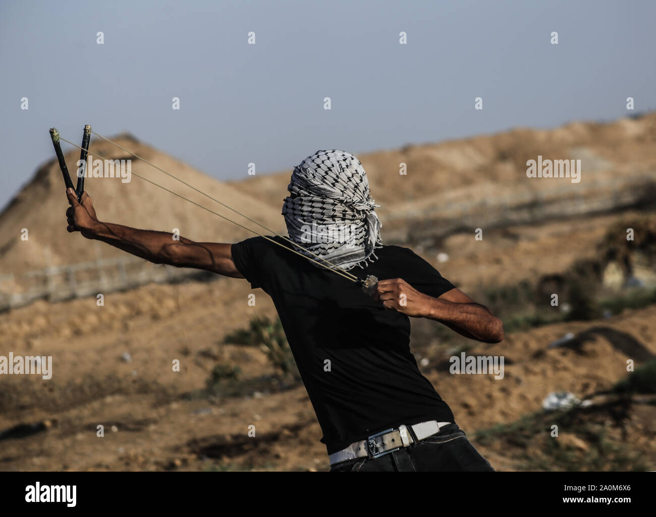 Gaza, Palestine. 20th Sep, 2019. A Palestinian demonstrator uses a ...