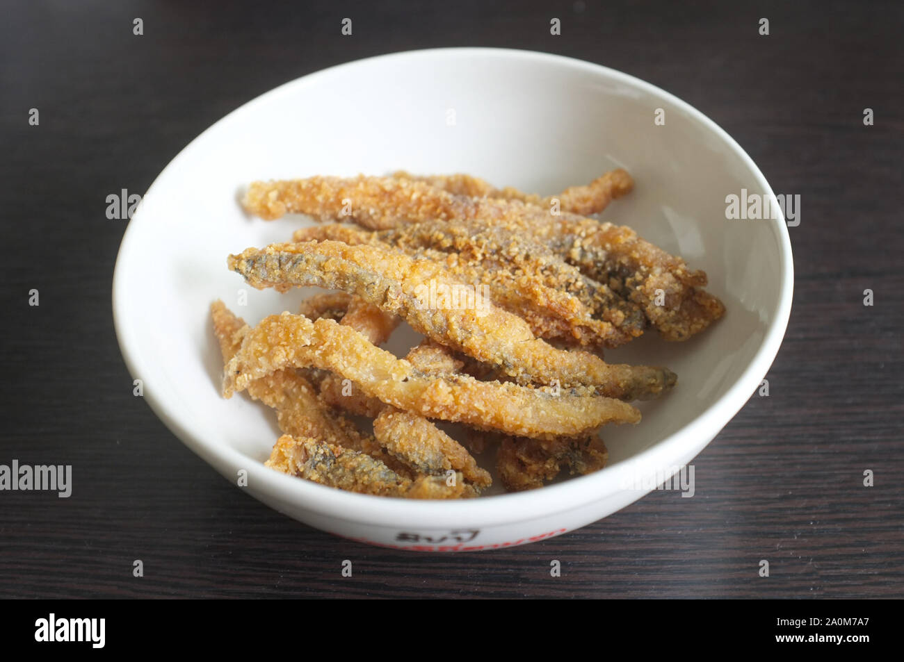 Fried small fish crispy deep hi-res stock photography and images - Alamy