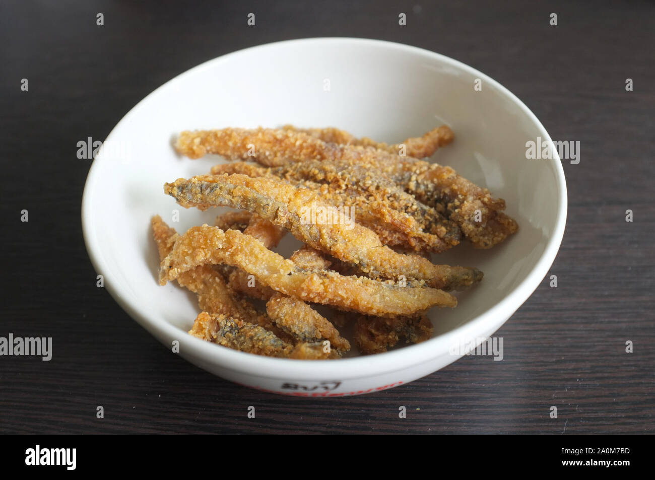 Fried small fish crispy deep hi-res stock photography and images - Alamy