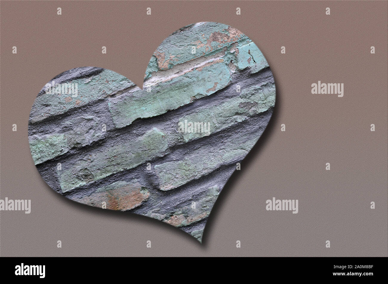 close up of a big, flinty heart, isolated on brown and gray background ...