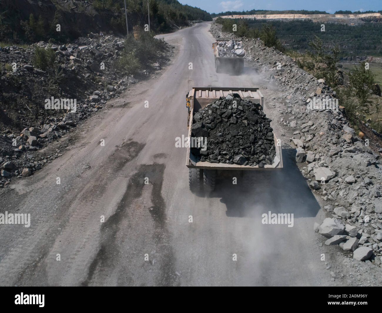 Huge on road industrial dump truck in a stone quarry loaded ...