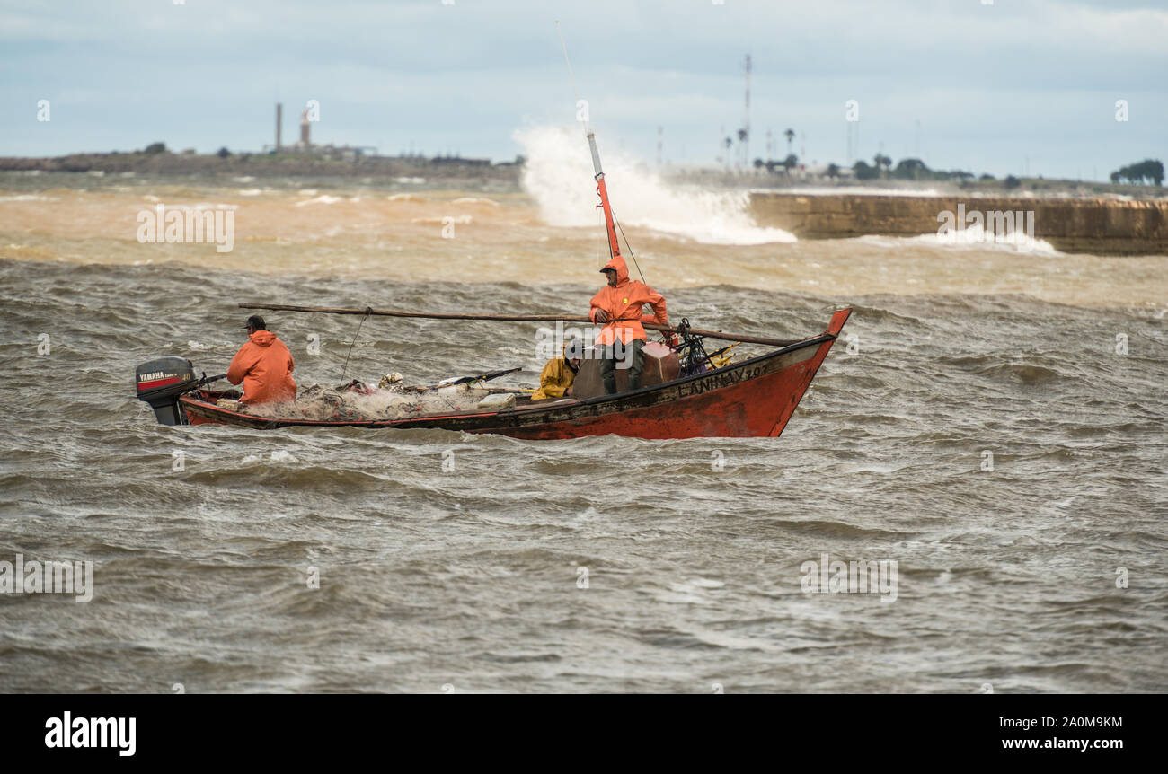 Montevideo, Uruguay - March 5 2016: Fishing boat and fishermen on the ...