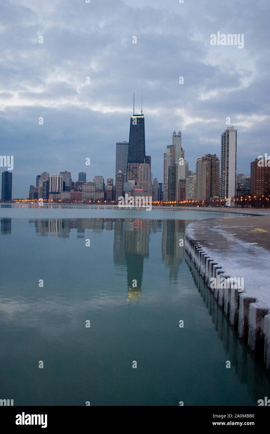 The John Hancock building towers over the surrounding Chicago skyline ...