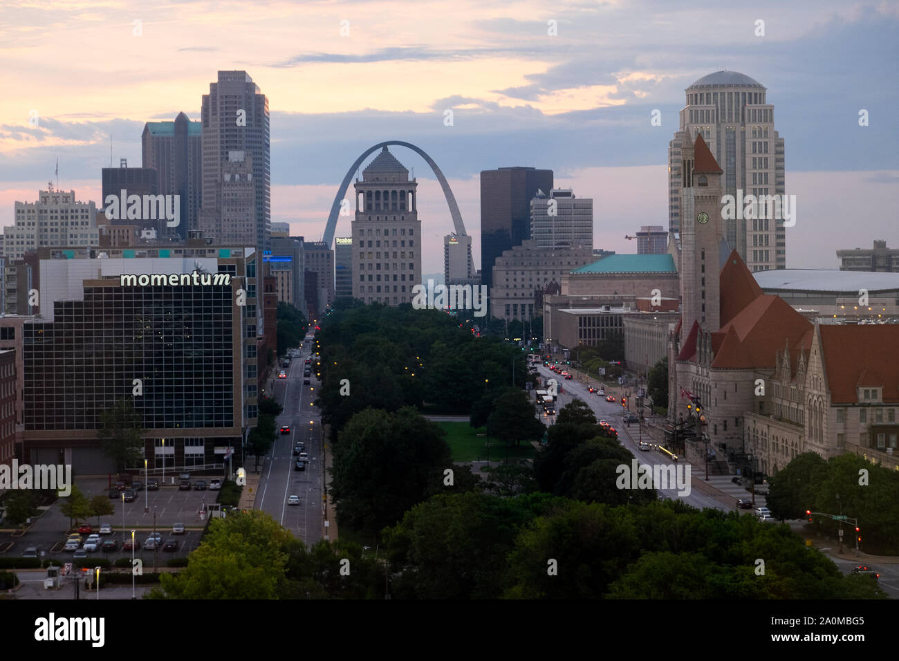 Just before sunrise, clouds roll over the St. Louis, MO skyline ...