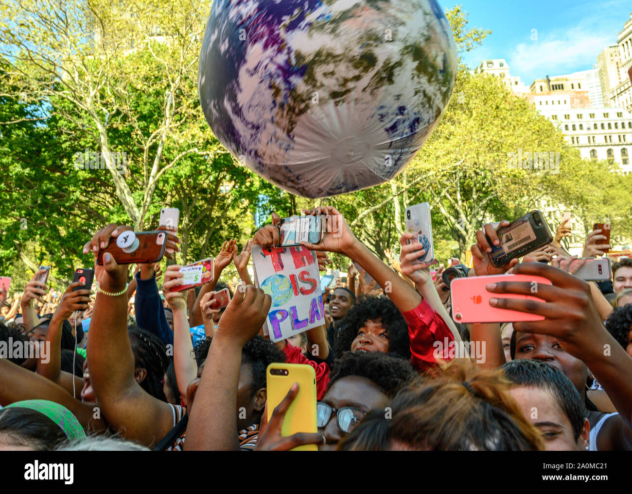 New York, USA, 20 September 2019. People use their phones to photograph ...