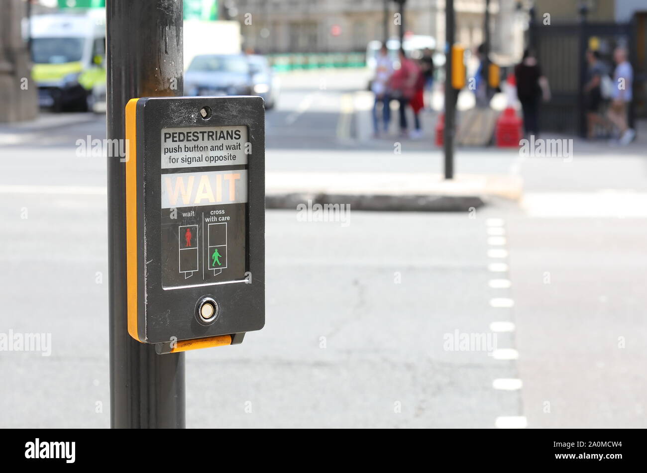 Pedestrian crossing button London UK Stock Photo - Alamy