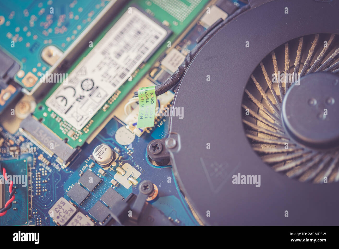 Computer cooling fan for overclocking on a circuit board, close up ...