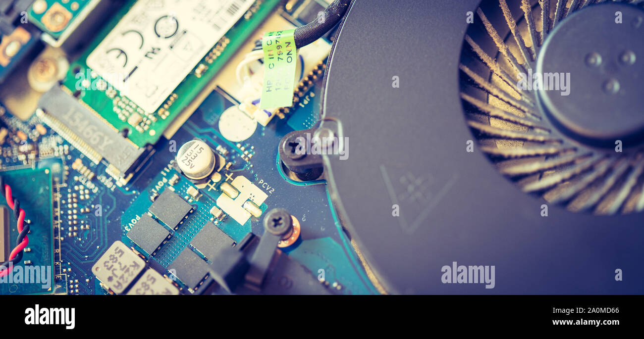 Computer cooling fan for overclocking on a circuit board, close up ...