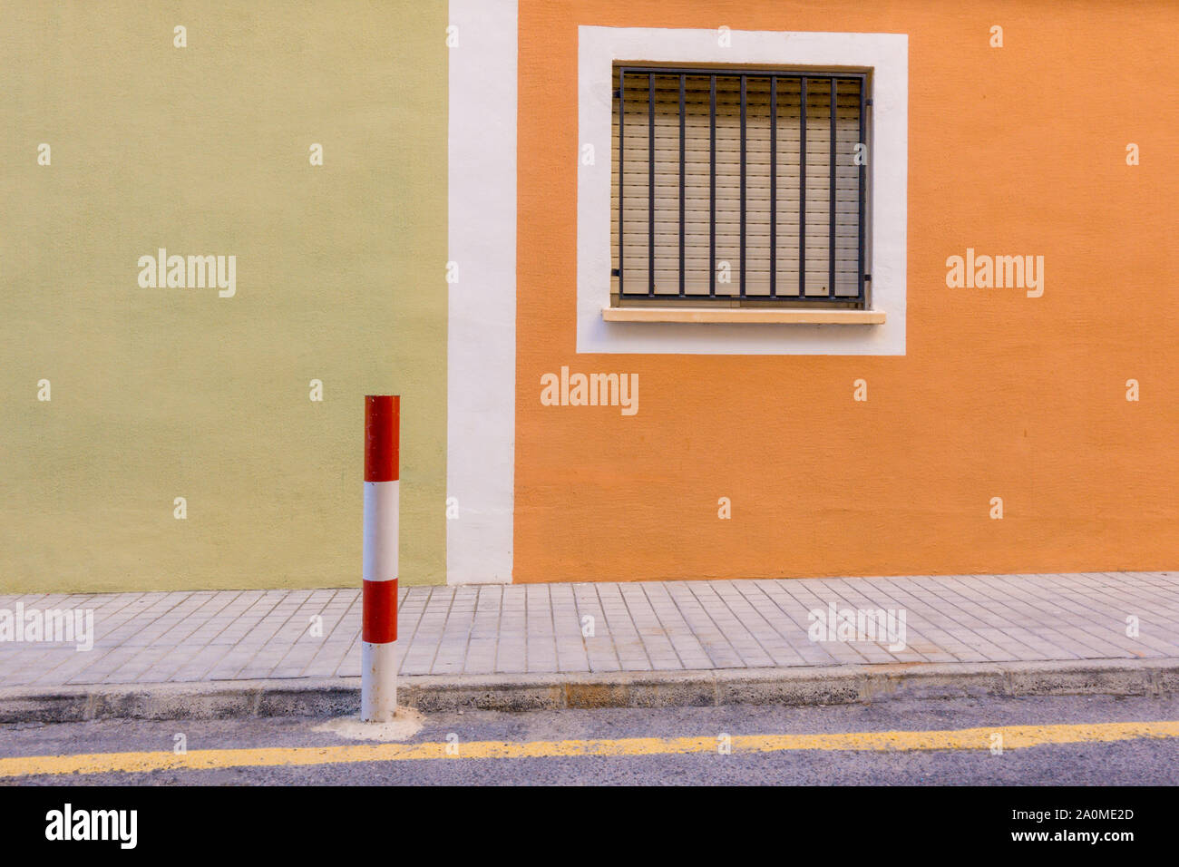 City background. Window on colorful wall and pavement Stock Photo - Alamy