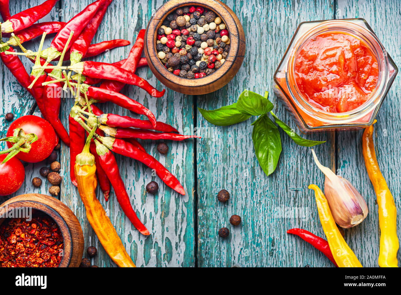 Spicy hot chili sauce with of chilli pepper Stock Photo - Alamy