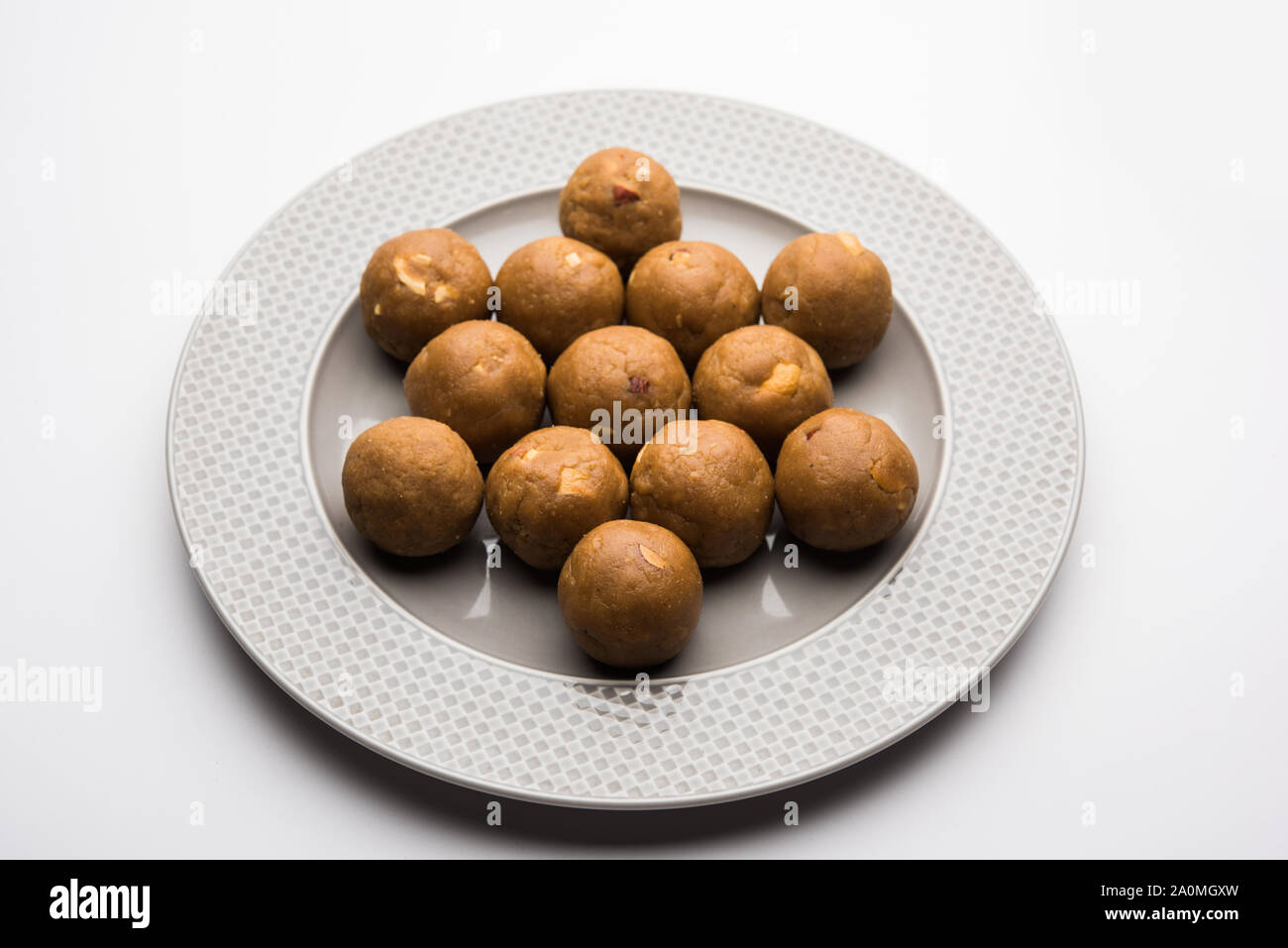 Churma Ladoo / atta laddoo / wheat flour laddu made using ghee and ...