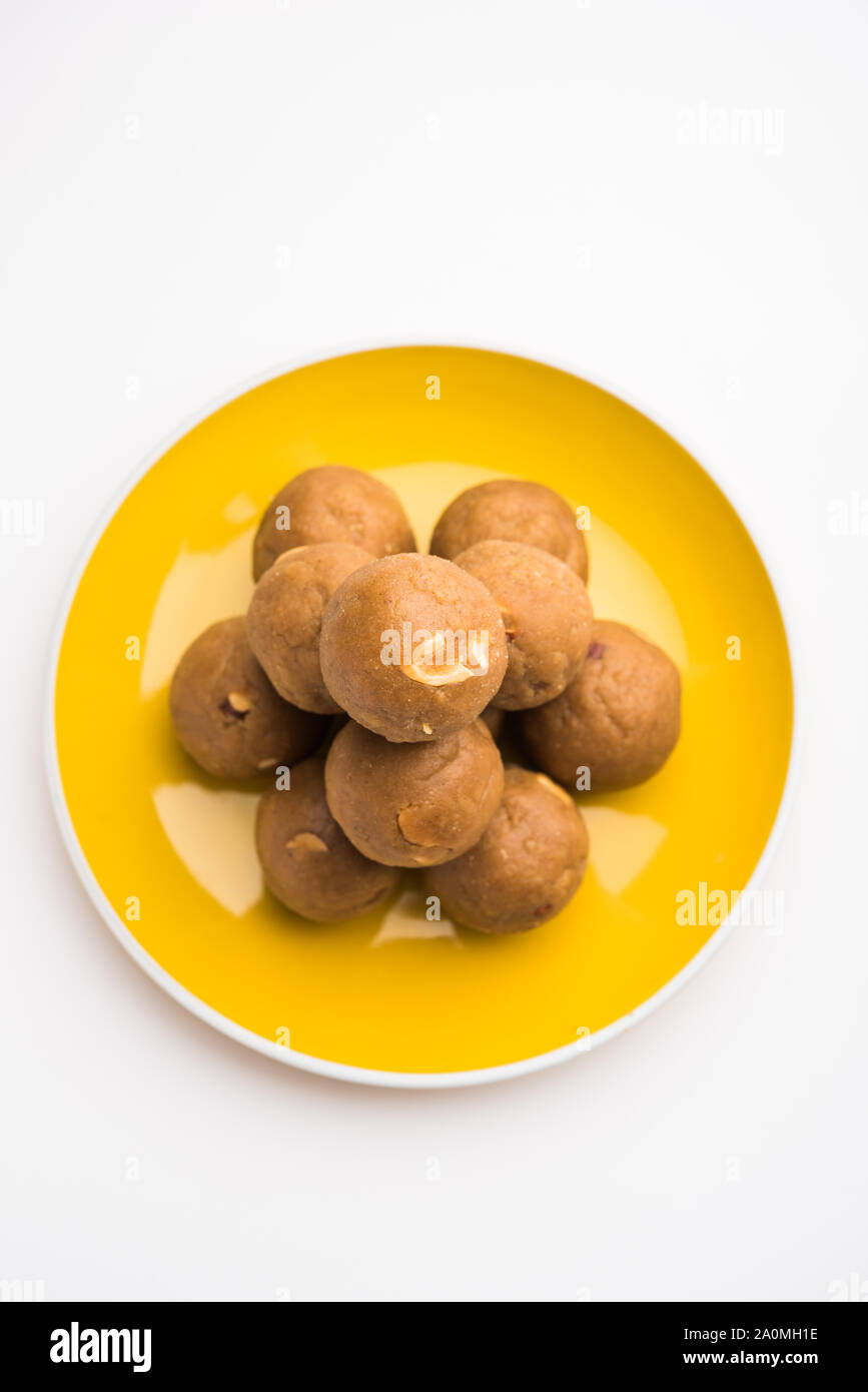 Churma Ladoo / atta laddoo / wheat flour laddu made using ghee and ...