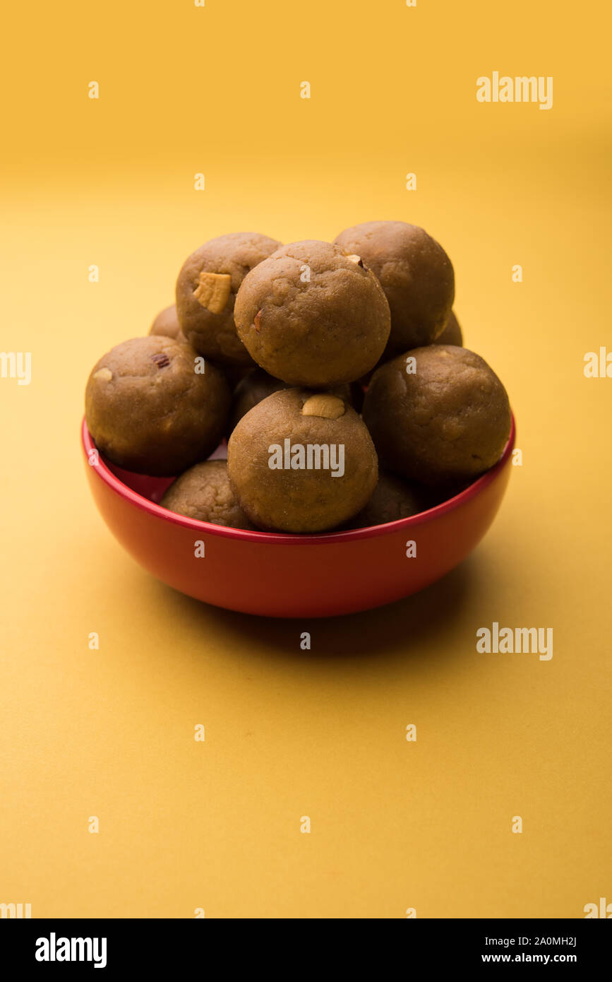 Churma Ladoo / atta laddoo / wheat flour laddu made using ghee and ...