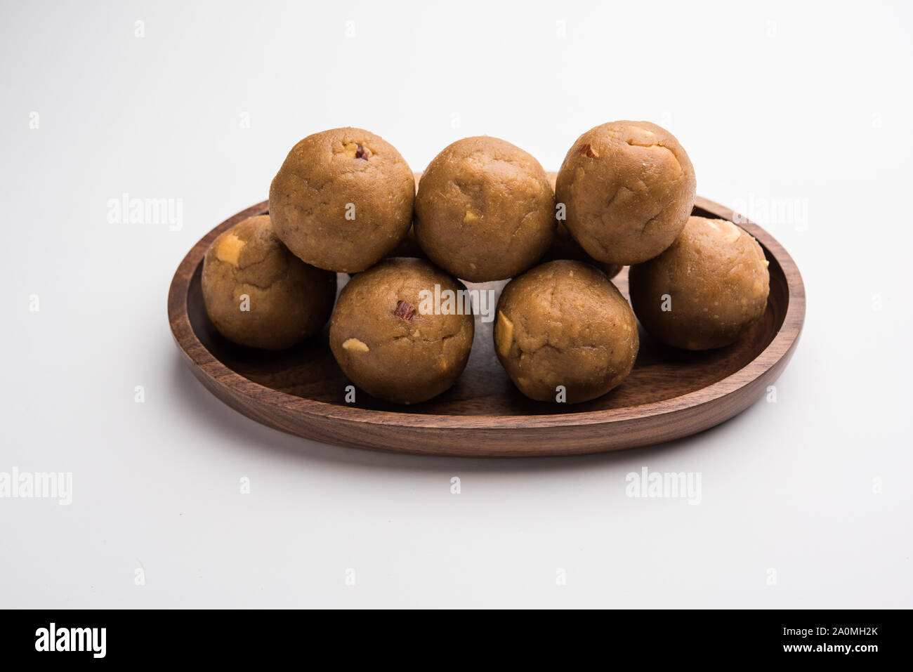 Churma Ladoo / atta laddoo / wheat flour laddu made using ghee and ...