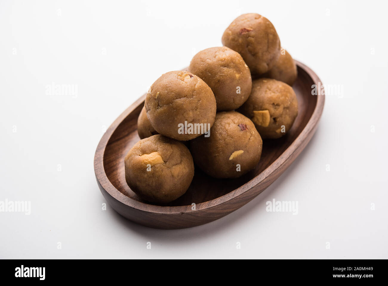 Churma Ladoo / atta laddoo / wheat flour laddu made using ghee and ...