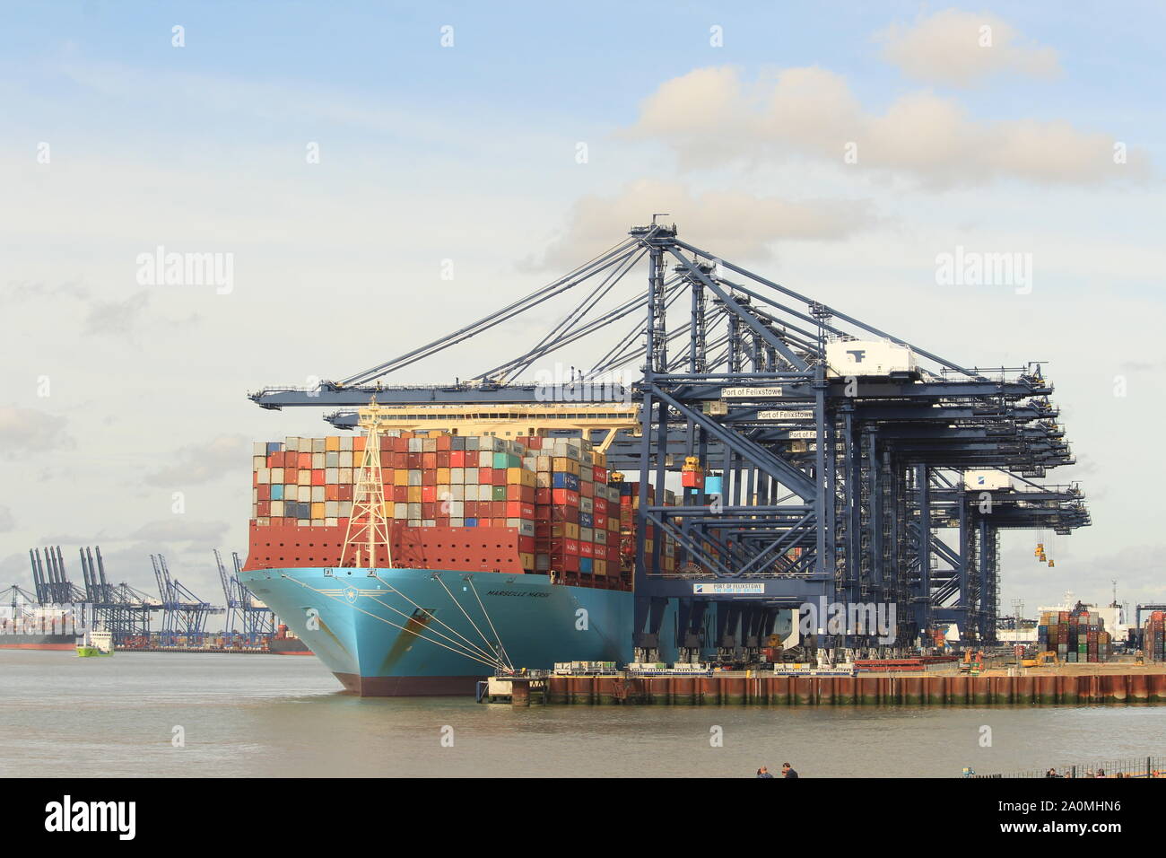 Shipping containers and cargo loaded onto a vessel at the British Port ...