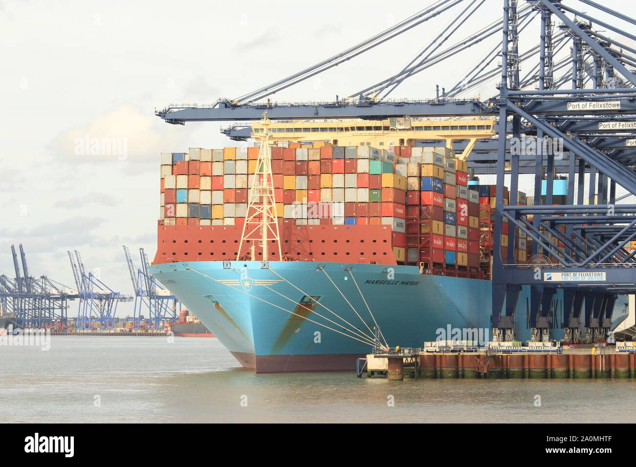 Shipping containers and cargo loaded onto a vessel at the British Port ...