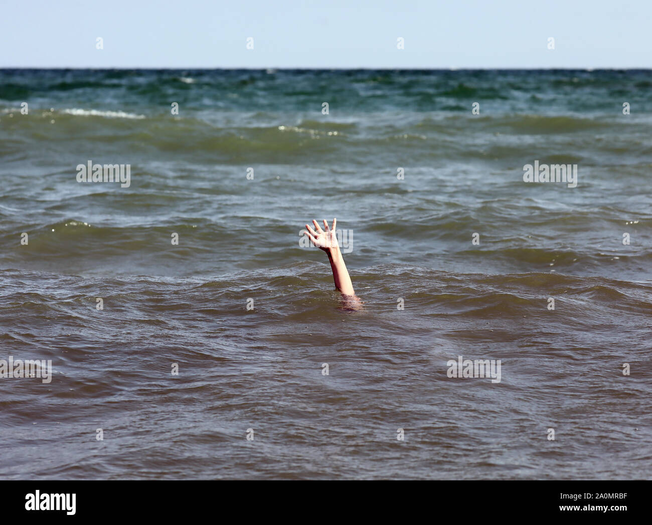 hand of the person asking for help while drowning in the sea Stock ...