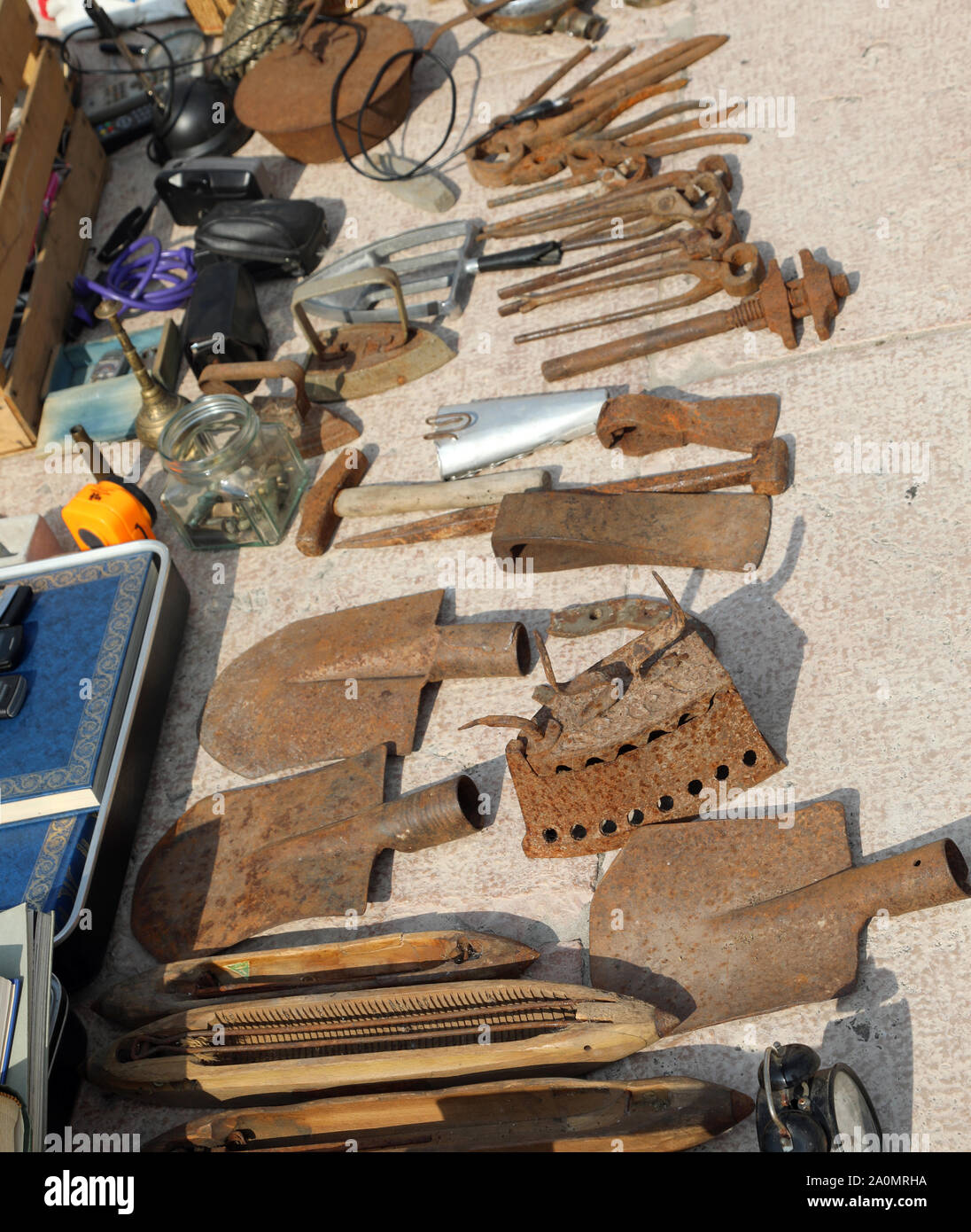 many very old rusted tools for sale at flea market Stock Photo - Alamy