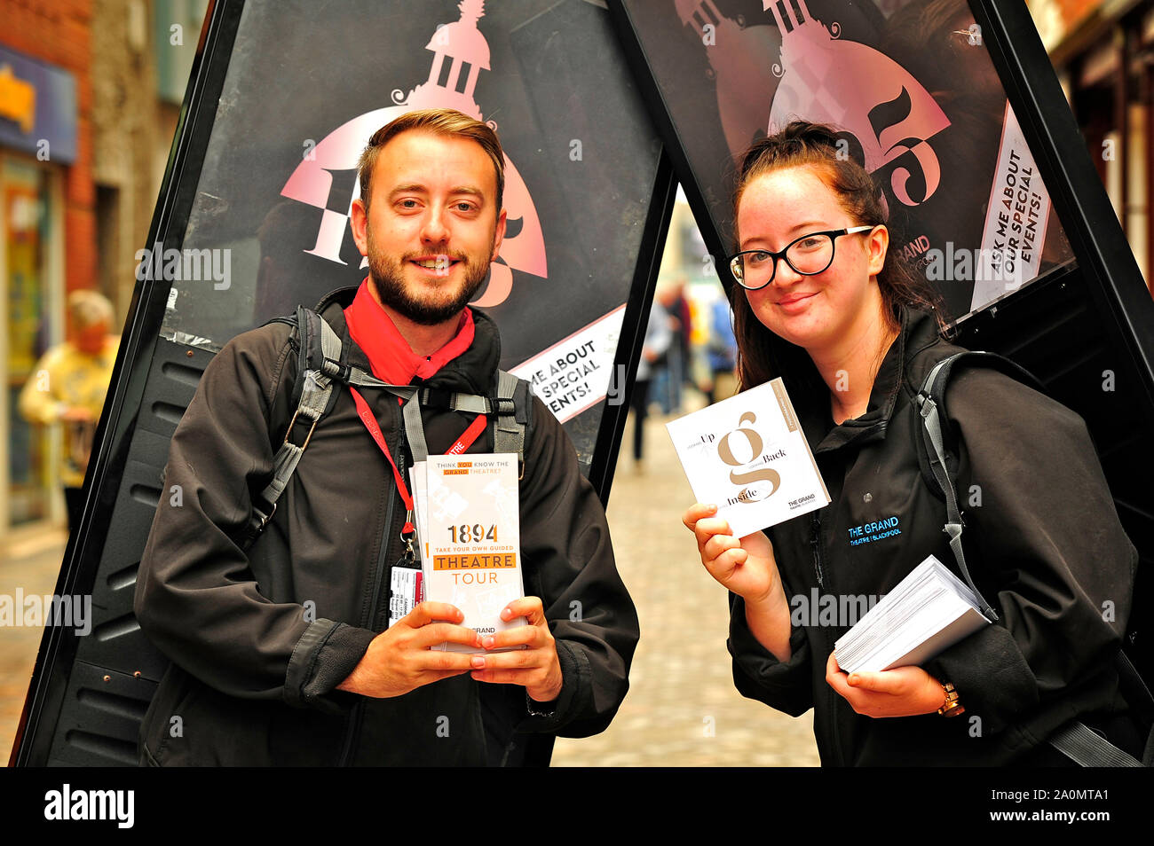 People Handing Out Leaflets High Resolution Stock Photography and ...