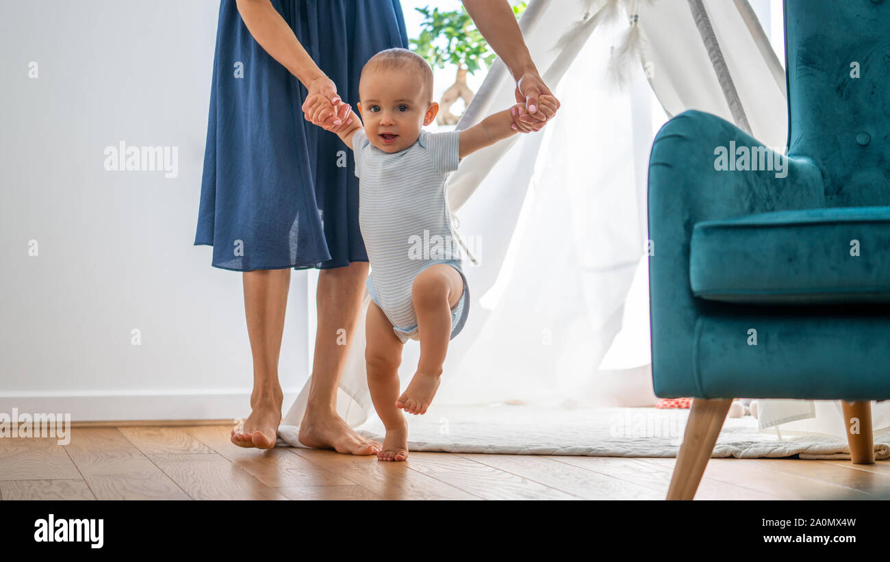 Mother take son hands hi-res stock photography and images - Alamy