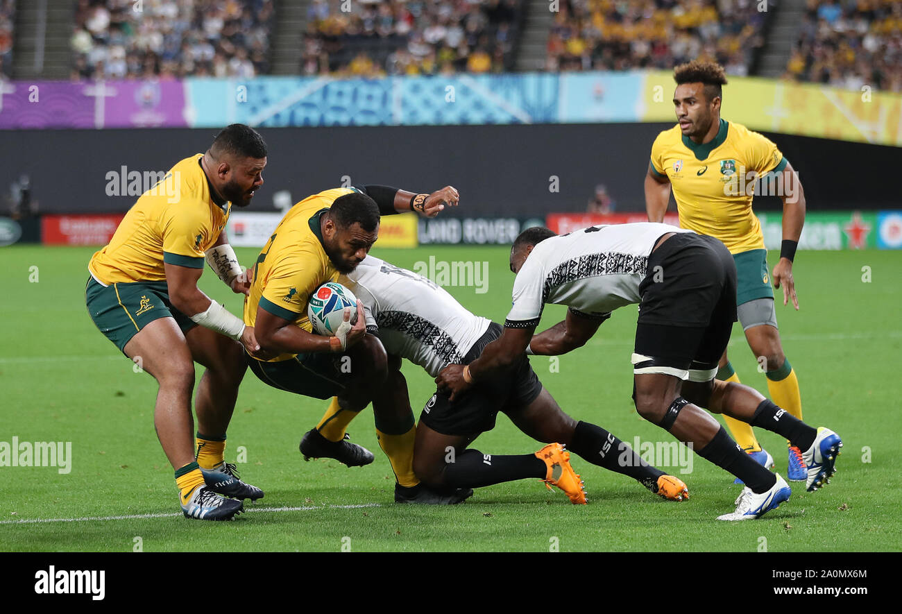 Australia's Samu Kerevi is tackled by Fiji's Levani Botia during the ...