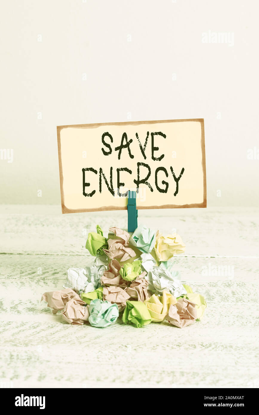 Writing note showing Save Energy. Business concept for decreasing the ...