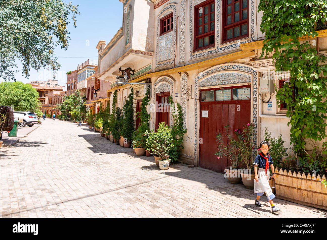 Kashgar Renovated Old City Uyghur School Girl is Walking down the ...