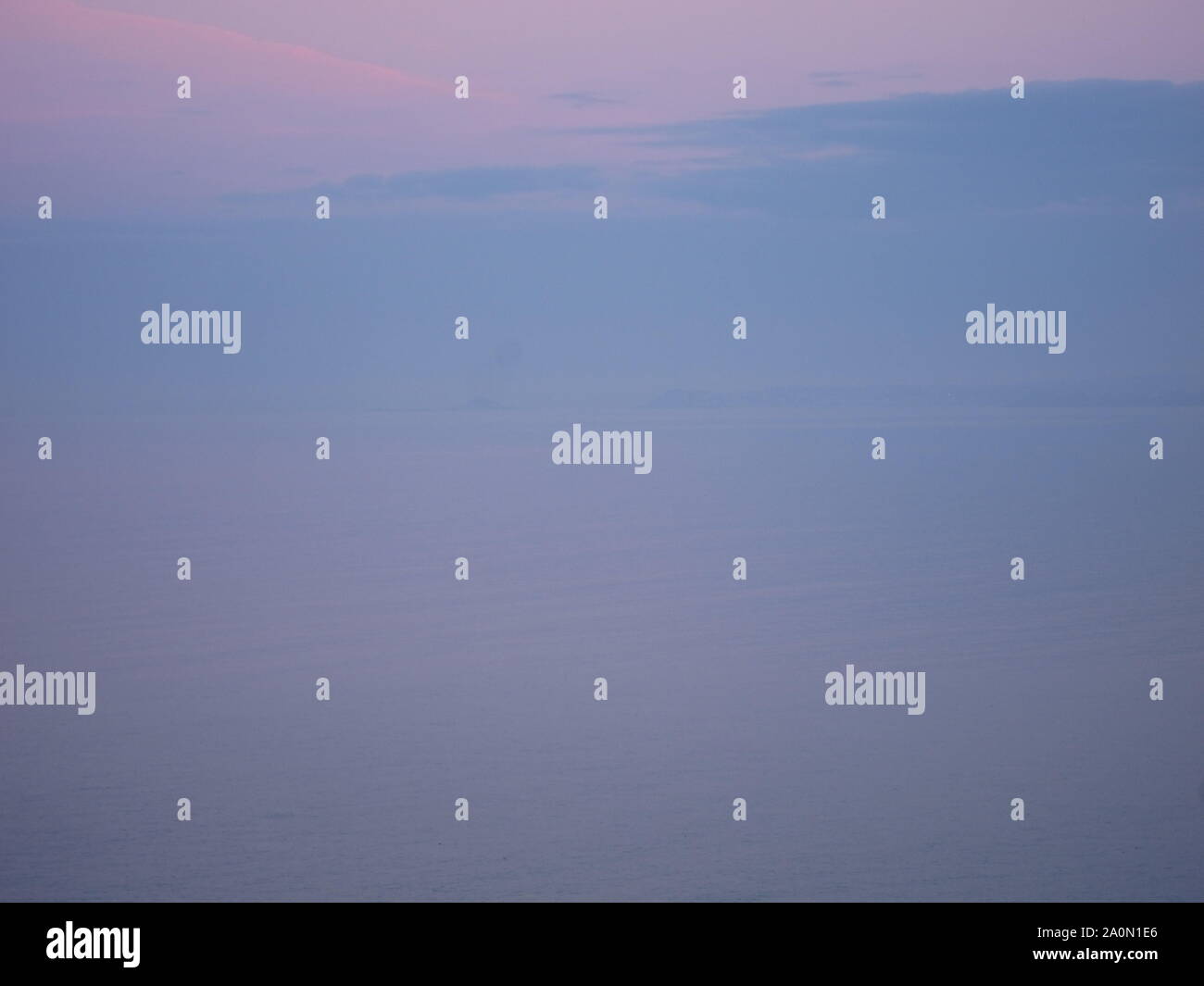 Mist on the sea at sunset Stock Photo - Alamy