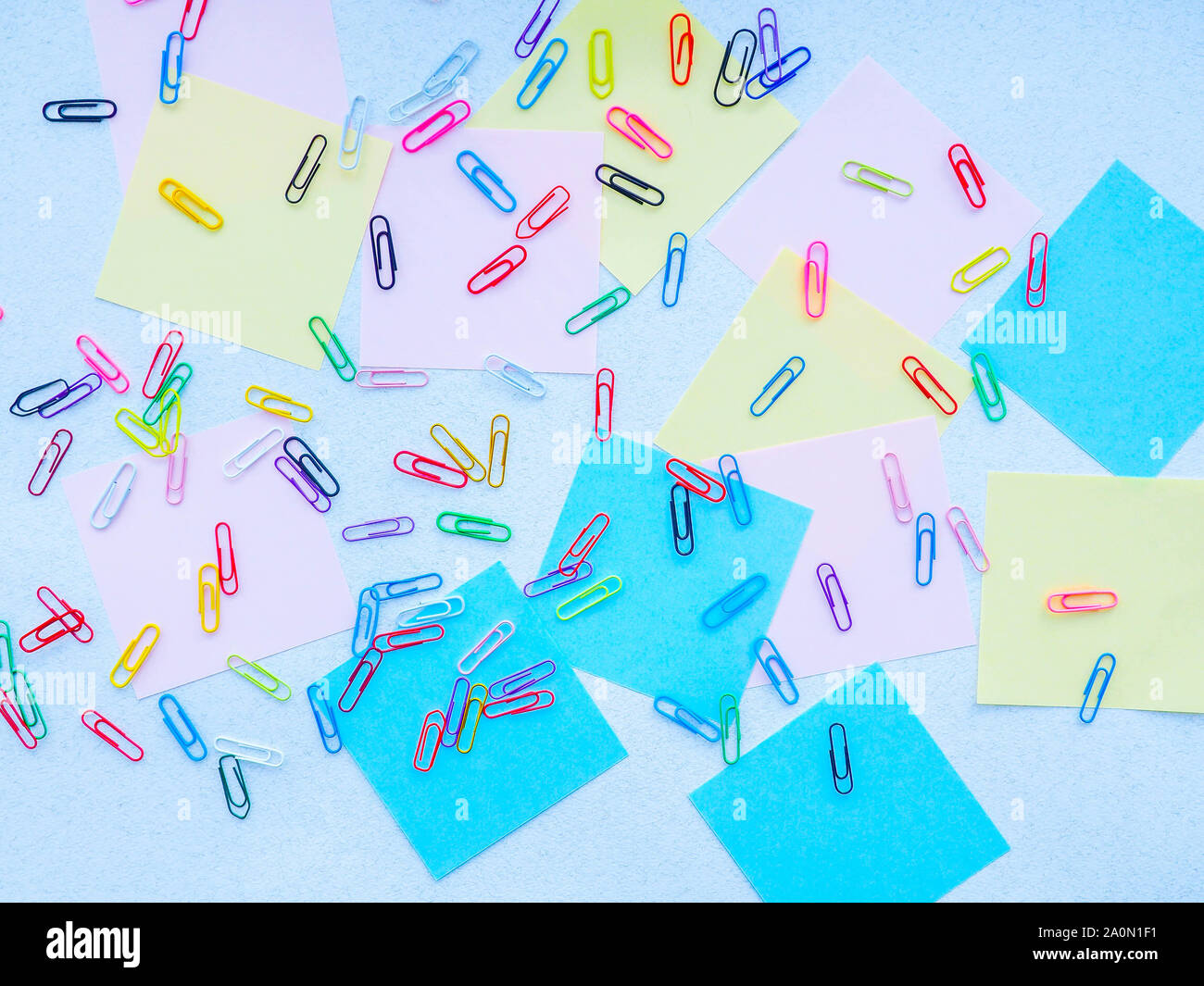 a lot of paper for notes and paper clips as background, flat lay Stock ...