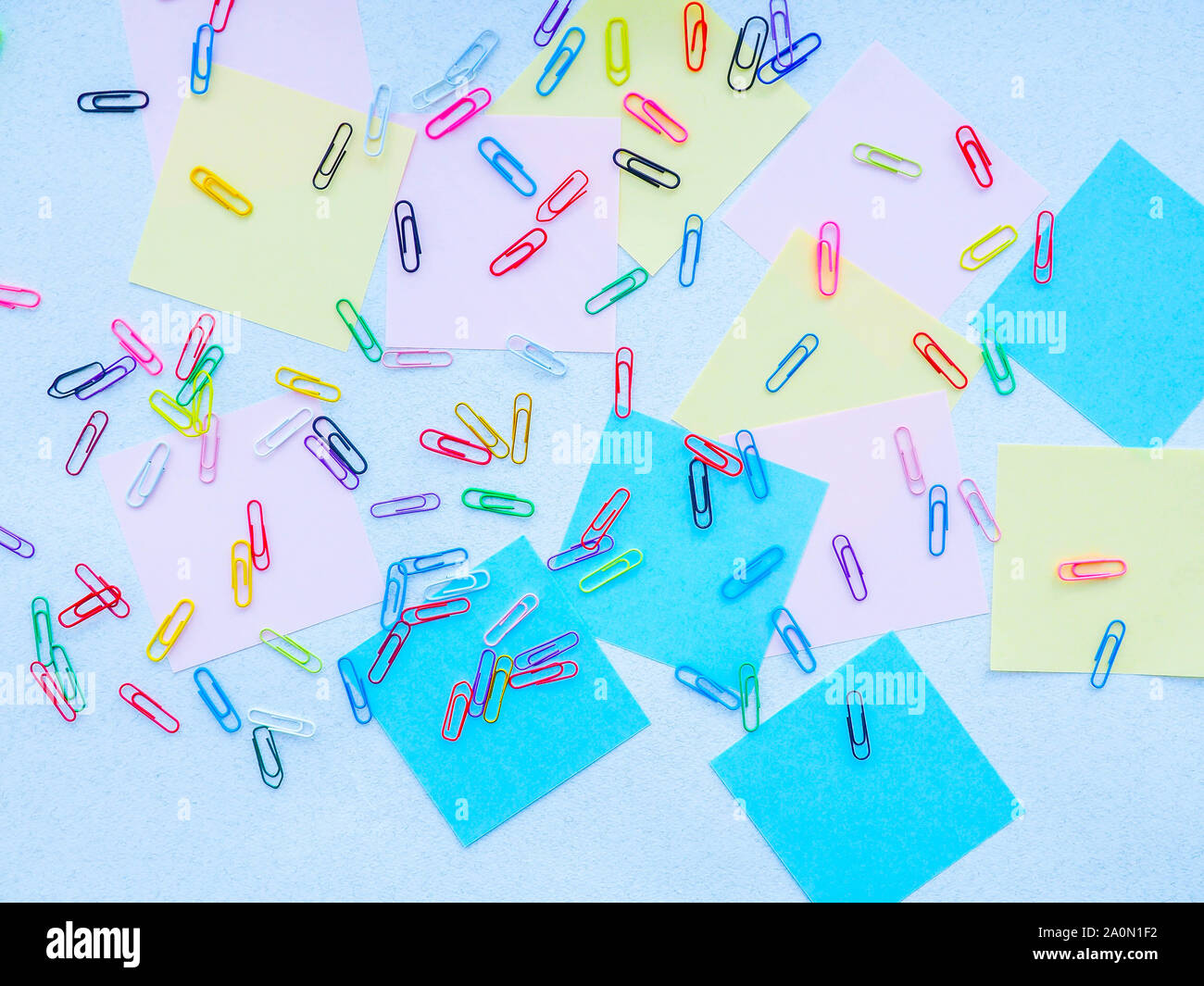 a lot of paper for notes and paper clips as background, flat lay Stock ...