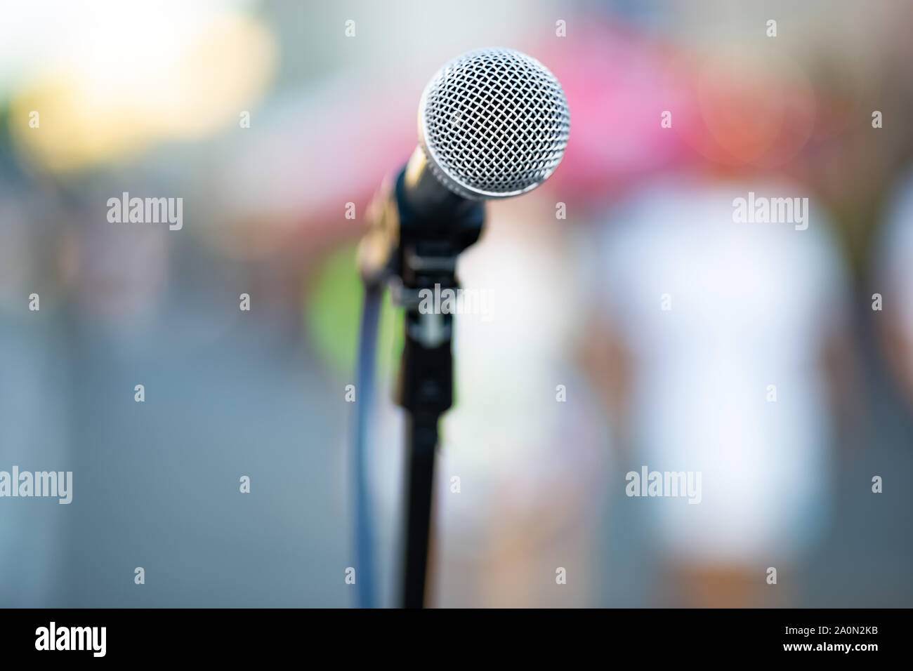 Stand microphone on blurry background close-up Stock Photo - Alamy