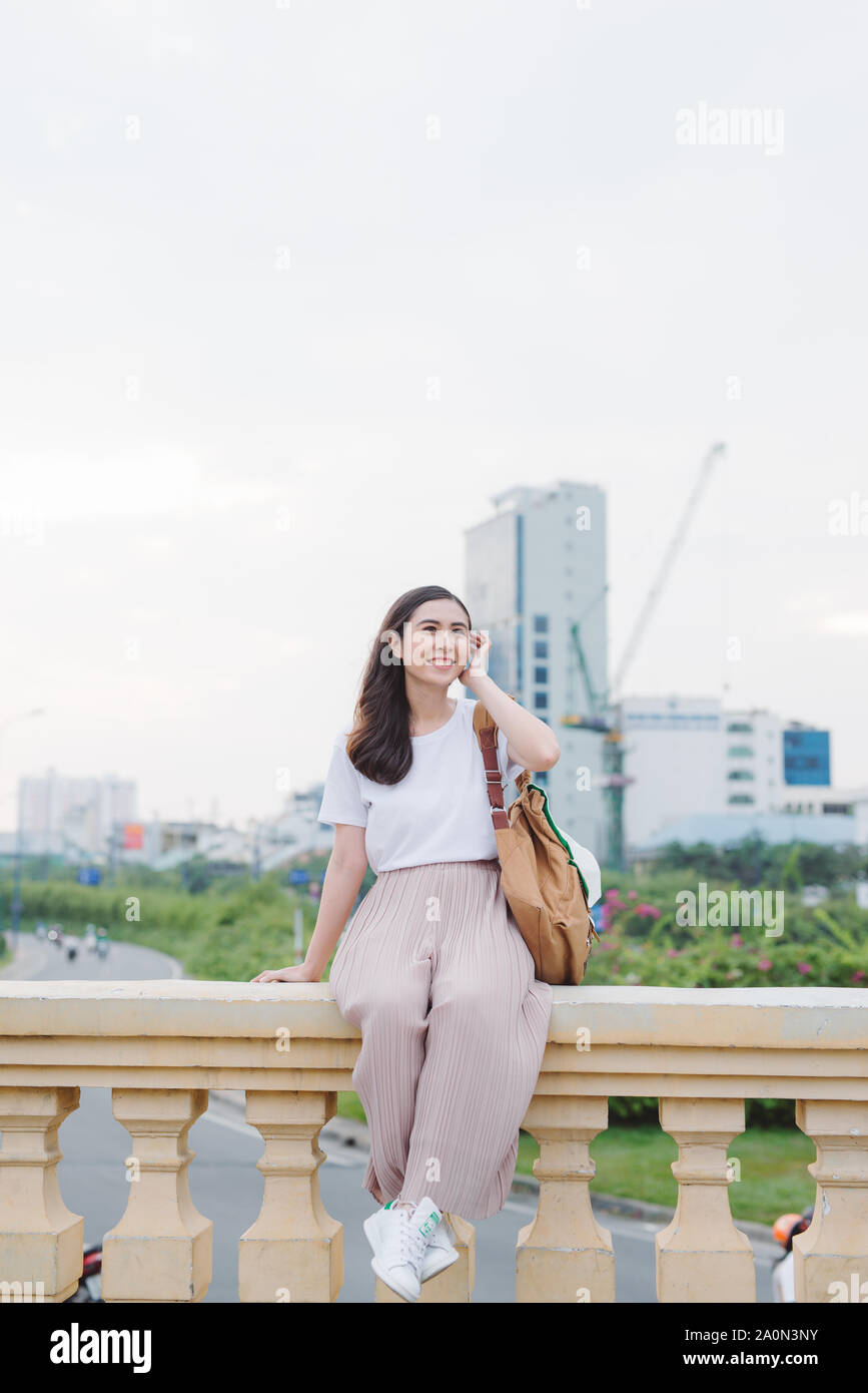 Female looking over bridge hi-res stock photography and images - Alamy