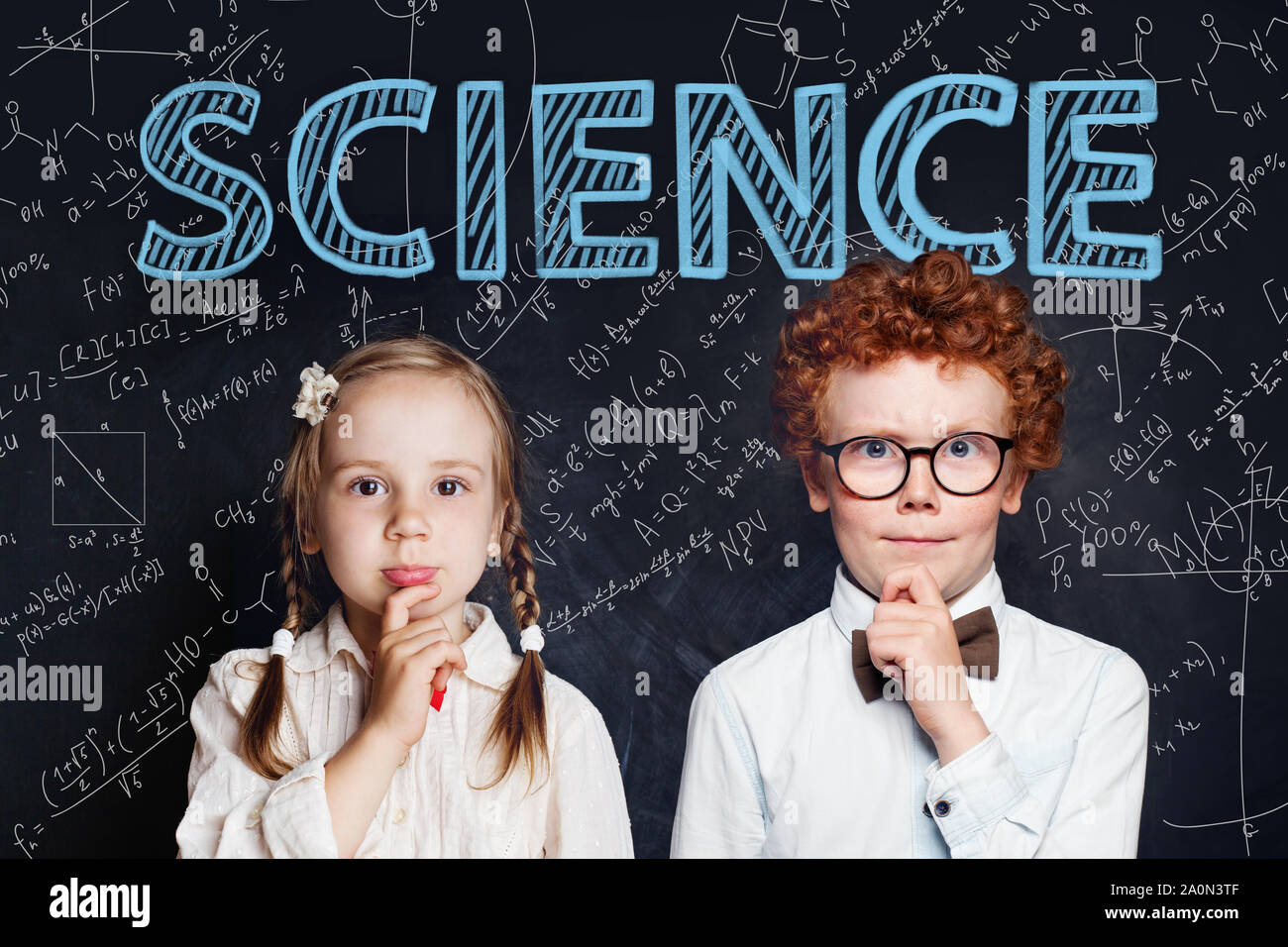 Thinking children school student on background with science and maths ...
