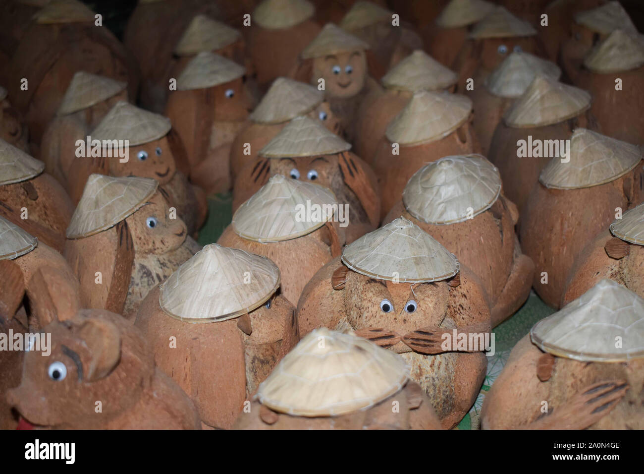JULY 18, 2019-MEKONG DELTA, VIETNAM ; Figurines of a monkey wearing a ...