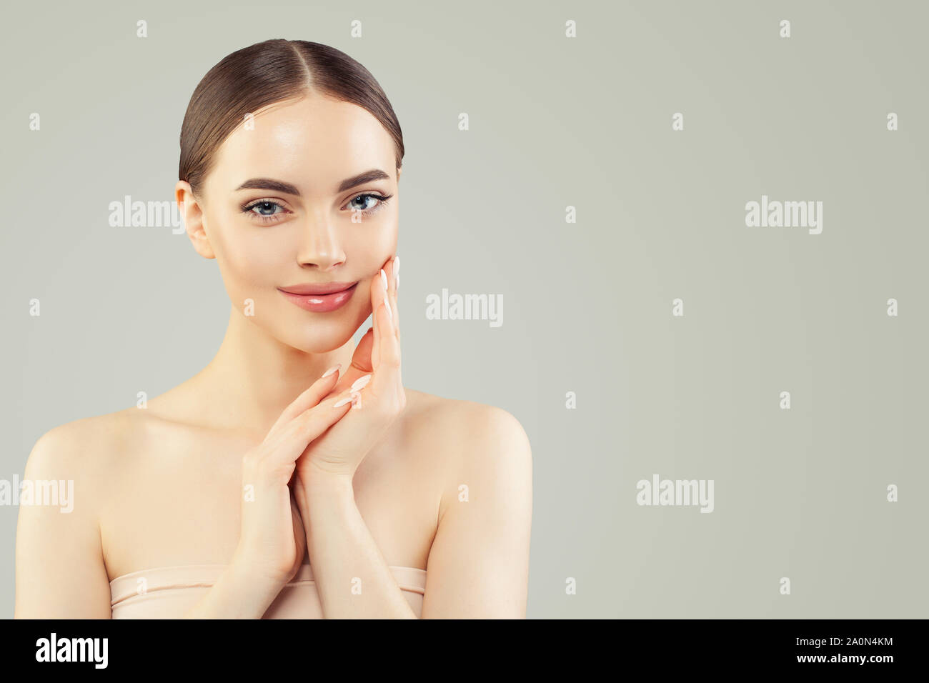 Cute spa model woman with clear skin. Skincare and facial treatment ...