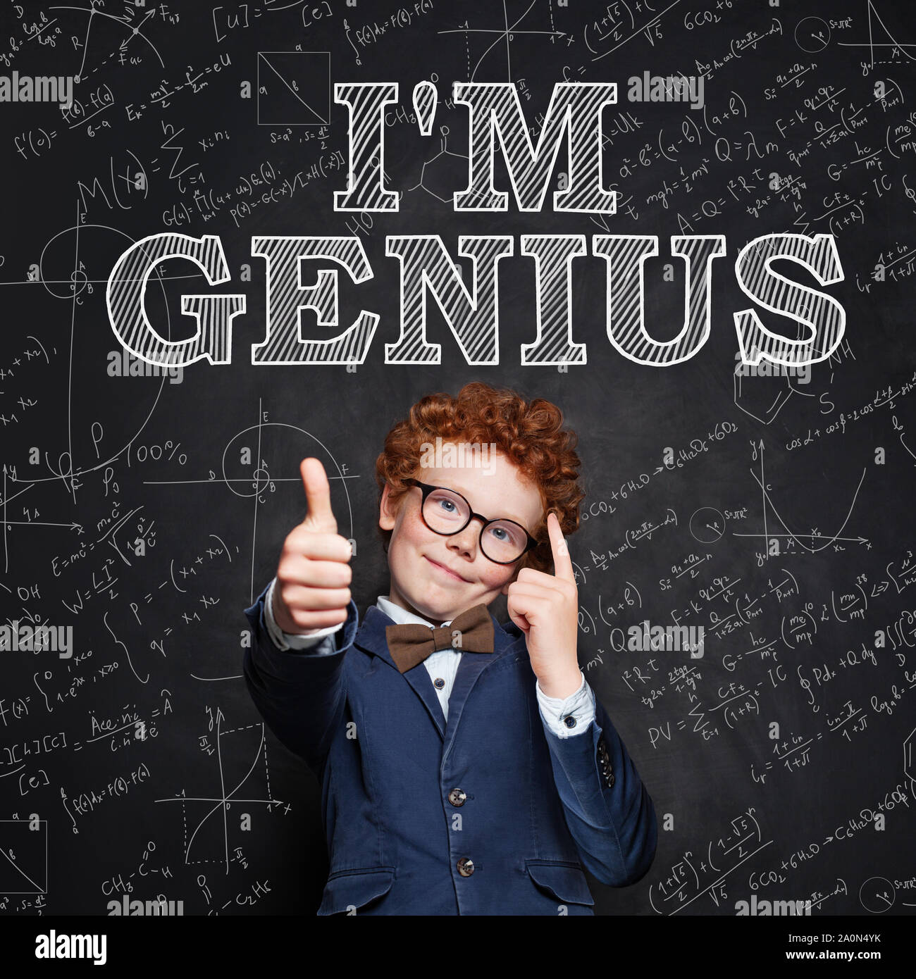 Handsome kid genius on chalkboard background portrait Stock Photo - Alamy