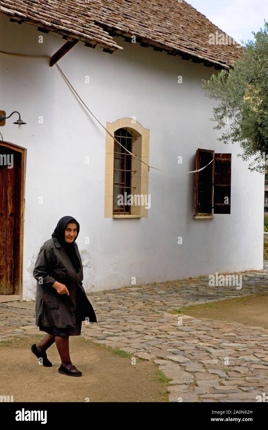 Old lady leaving church, Kakopetriá, Cyprus Stock Photo - Alamy