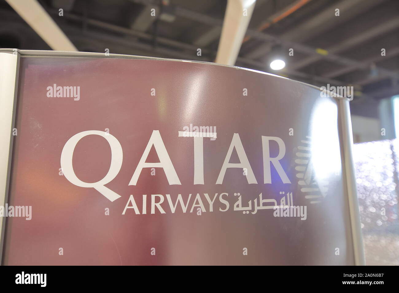 Qatar airline company sign Stock Photo - Alamy