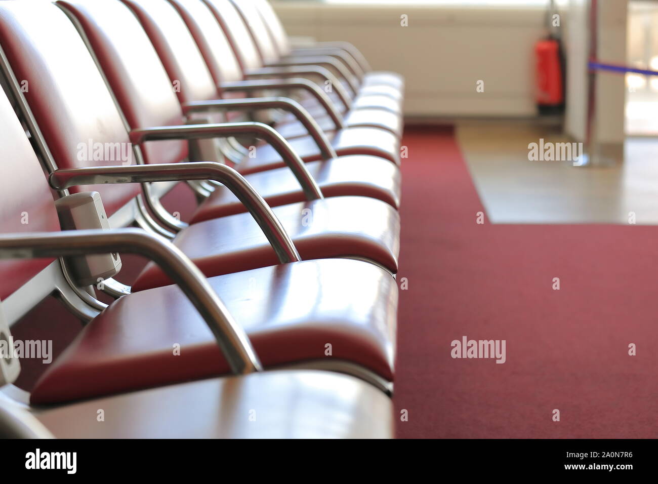 Chair bench at airport background Stock Photo - Alamy