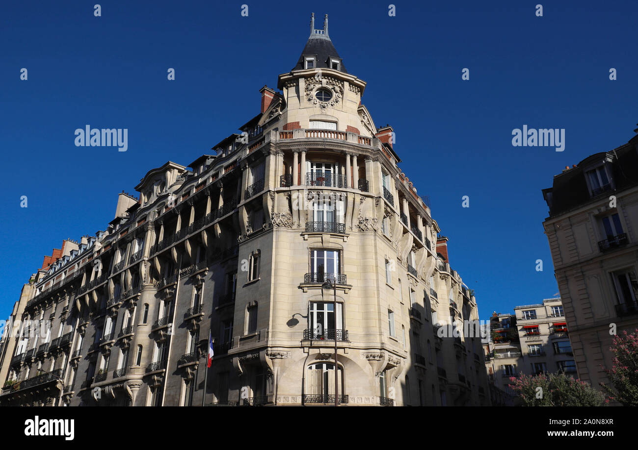 Traditional French house with typical balconies and windows. Paris ...