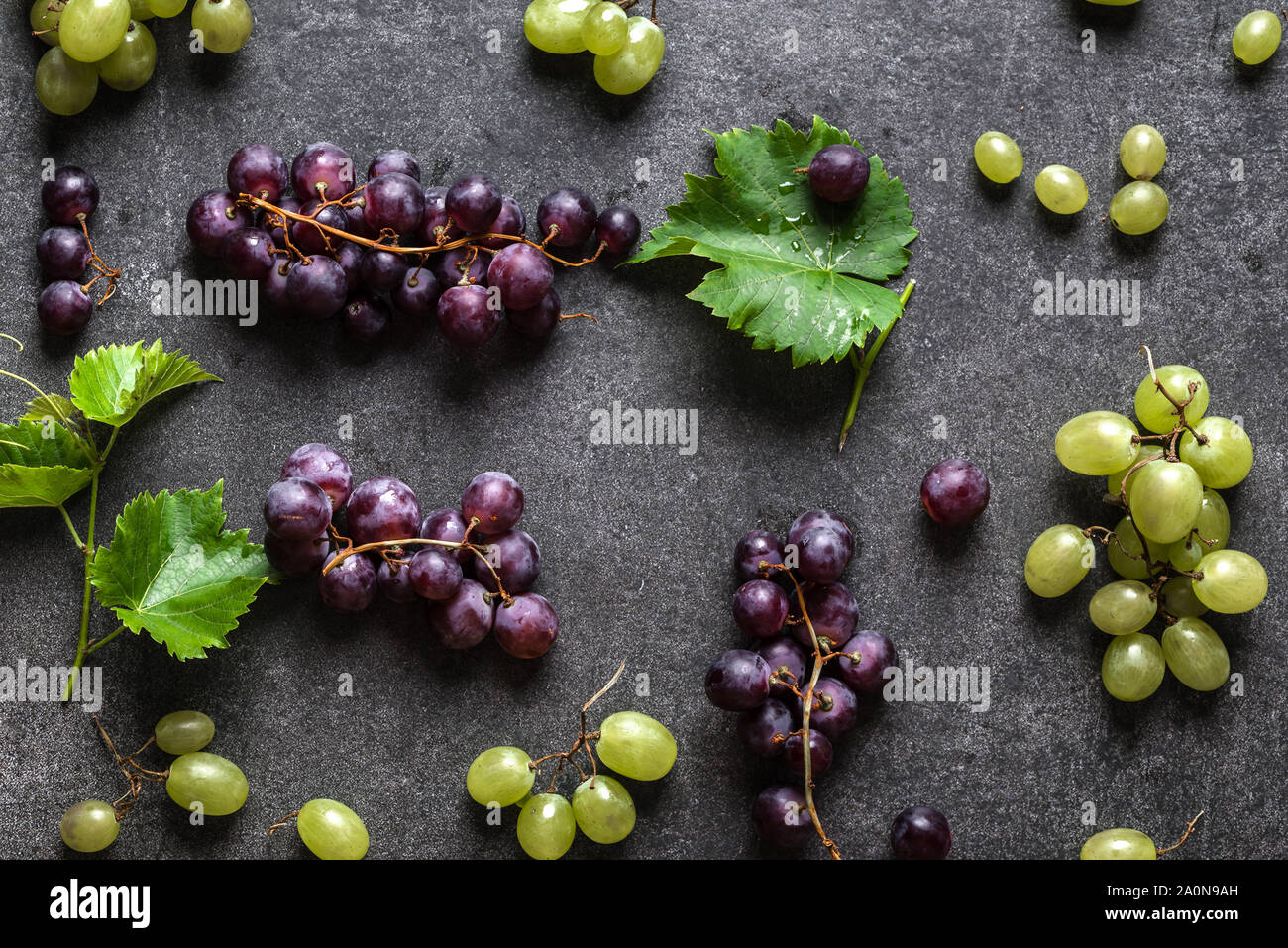 Fresh grape variety. Red and green grapes, top view Stock Photo - Alamy
