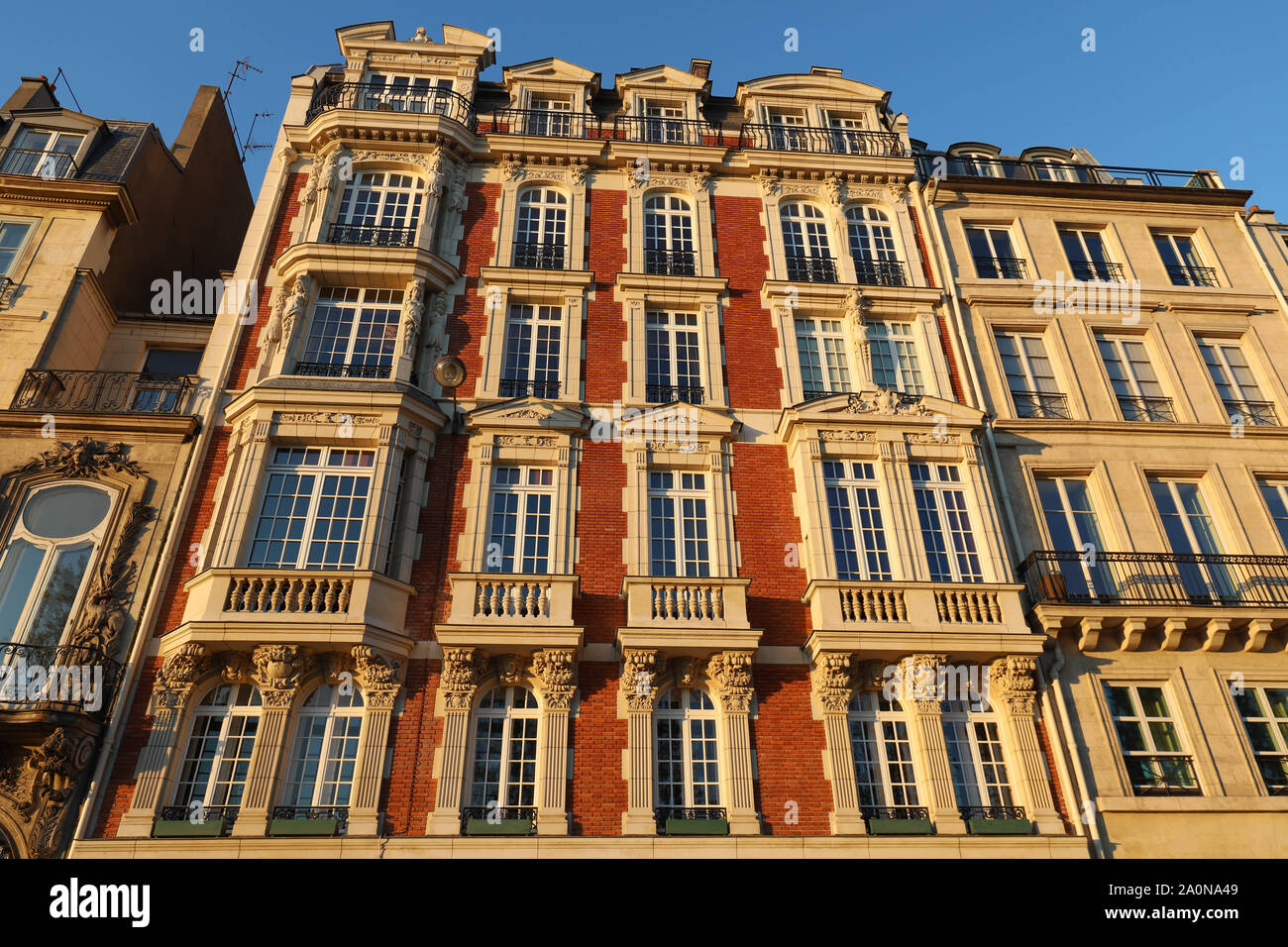 Traditional French house with typical balconies and windows. Paris ...