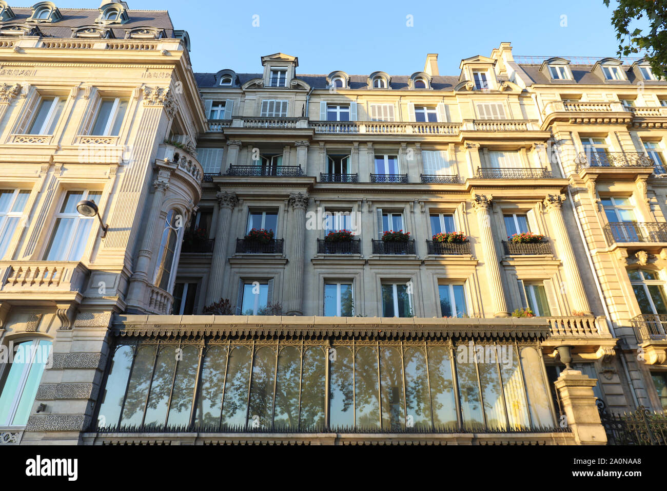 Traditional French house with typical balconies and windows. Paris ...