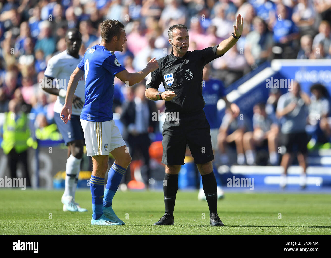 Referee Paul Tierney signals a review of VAR after a Leiceister City ...