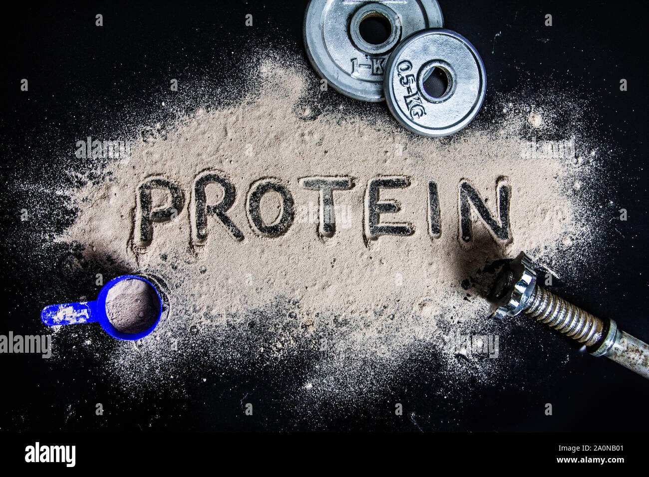 whey protein written on protein powder Stock Photo - Alamy