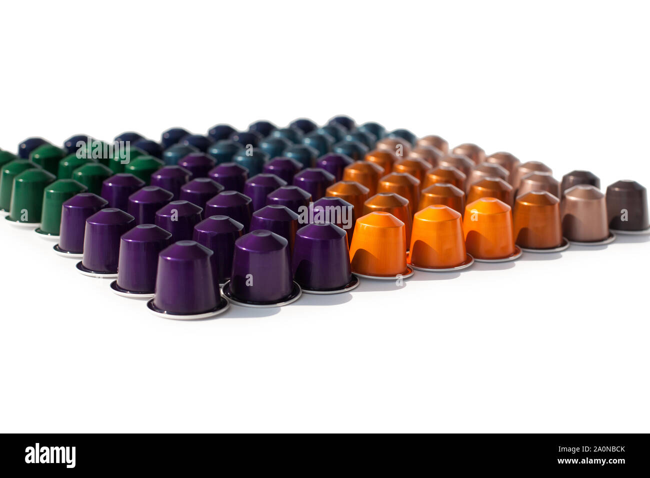 Coffee capsules different kinds and colors on a white background top ...