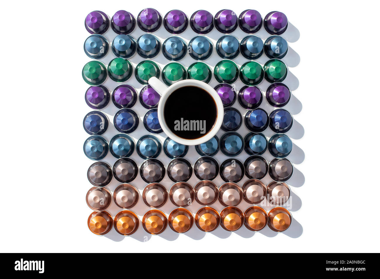 Coffee capsules different kinds and colors on a white background top ...