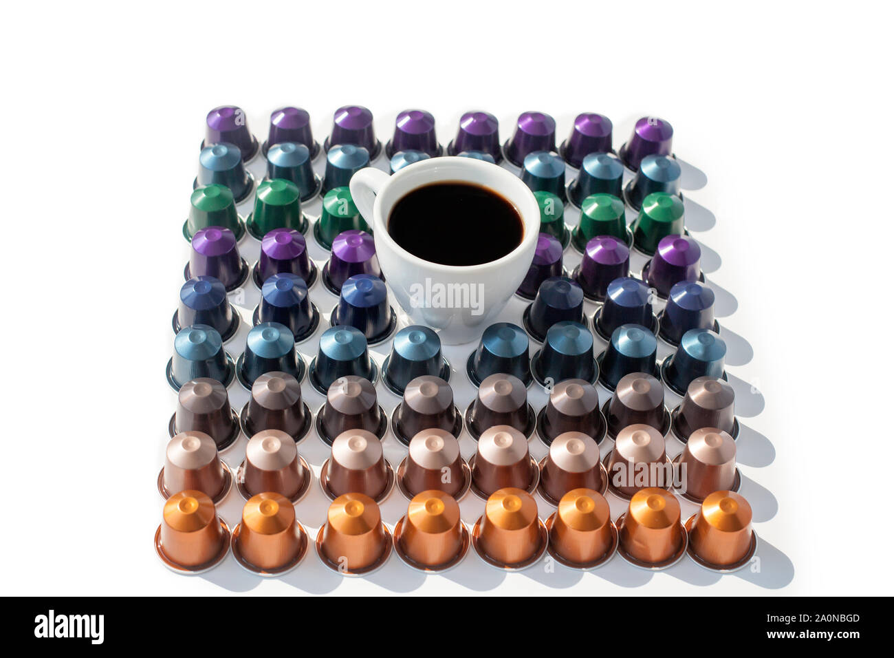 Coffee capsules different kinds and colors on a white background top ...