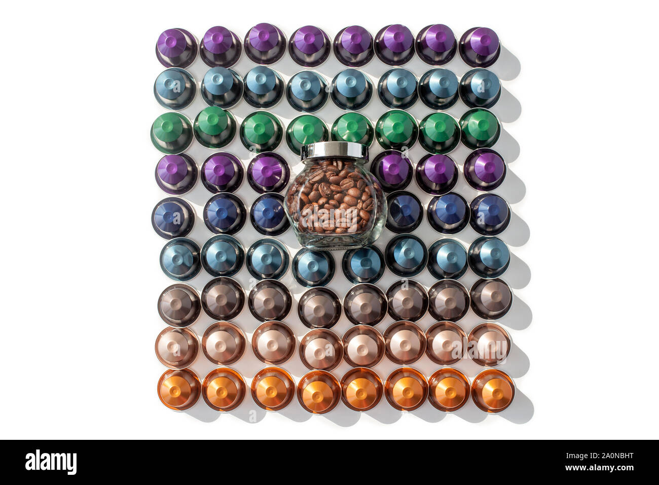 Coffee capsules different kinds and colors on a white background top ...